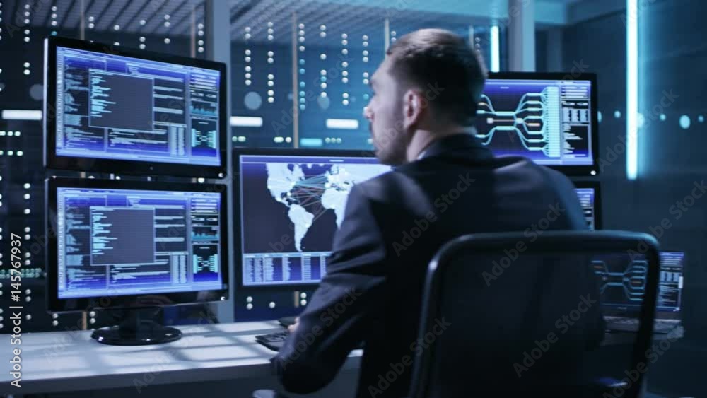 Technical Controller/ Operator Working Between Workstations with ...