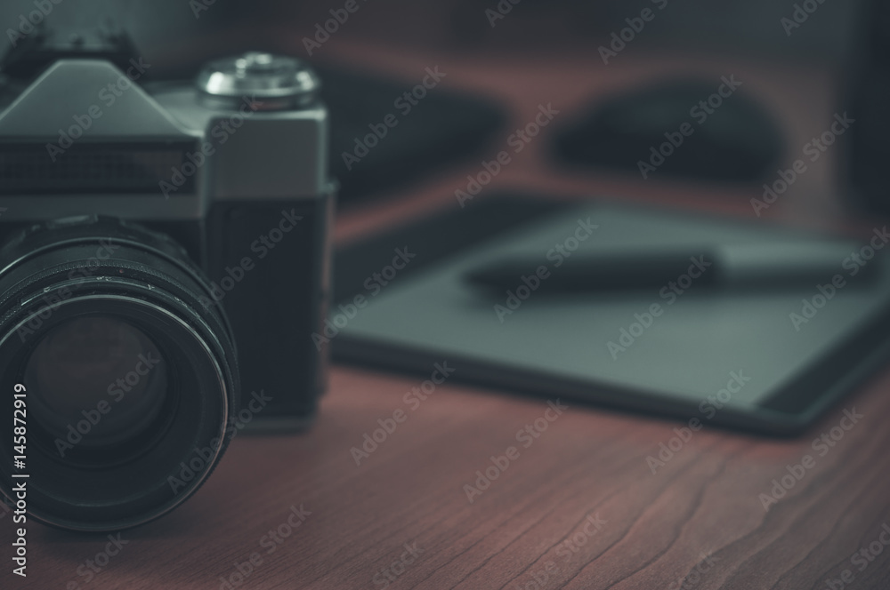 Still life of photographer desk in home office interior. Professional ...