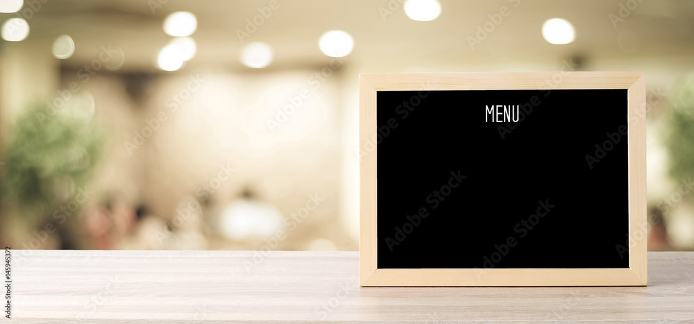 Blank menu board over blur cafe background, food and drink concept ...