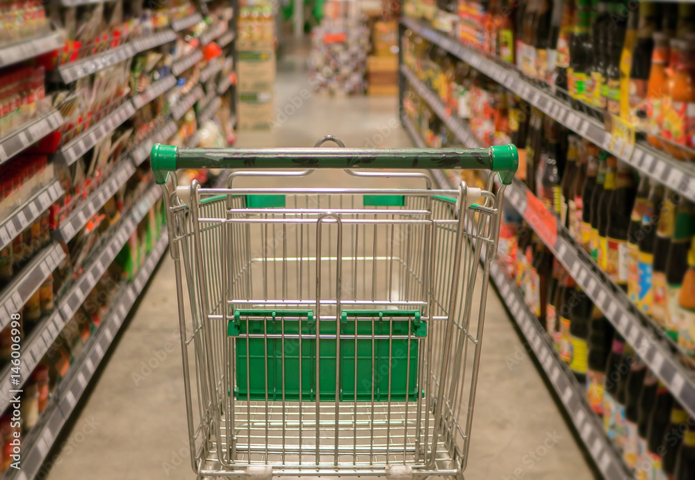 Abstract blurred photo of trolley in department store bokeh background ...