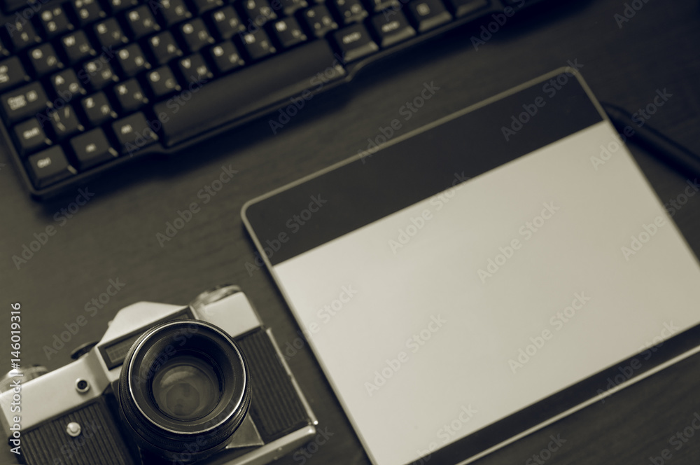 Still life of photographer desk in home office interior. Professional ...