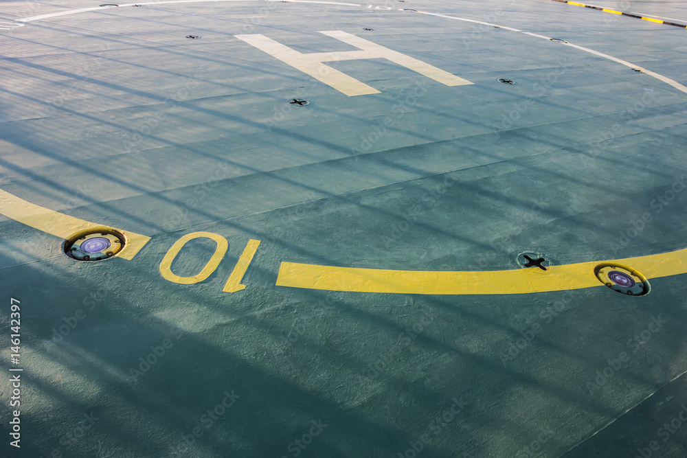 Helipad sign on a ship deck with spotlight and diameter figure Stock ...