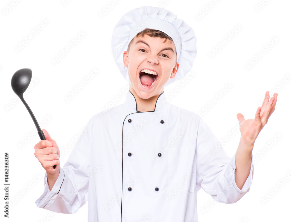Cheerful handsome teen boy wearing chef uniform. Portrait of a happy ...
