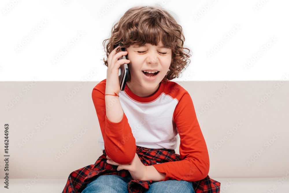 Kid using smartphone Stock Photo | Adobe Stock