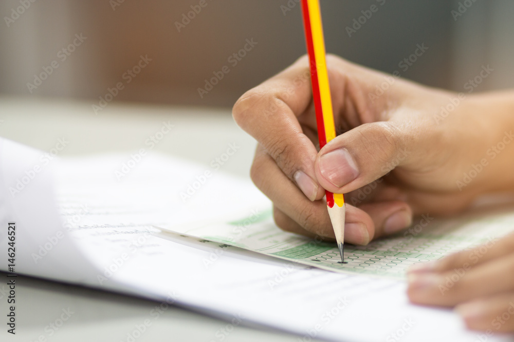 students hand testing doing examination with pencil drawing selected ...