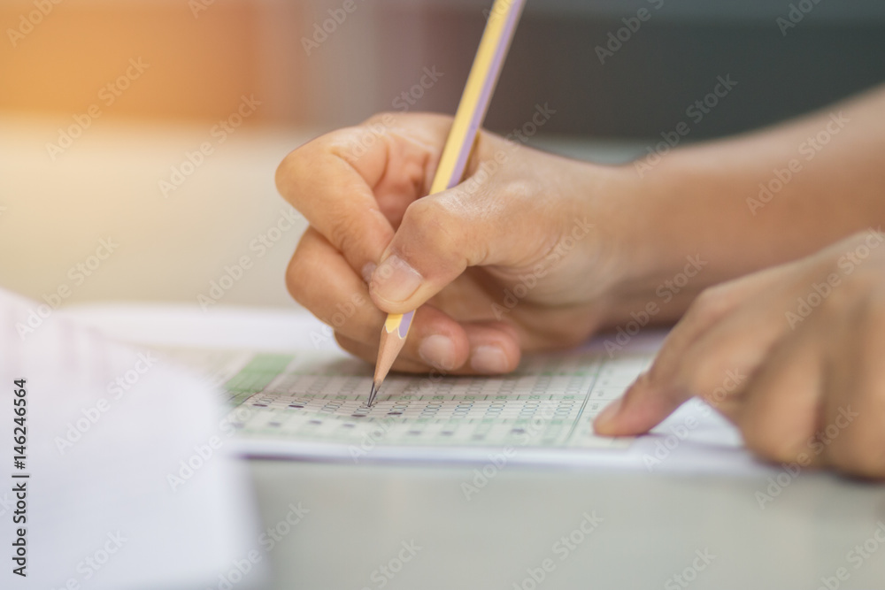 students hand testing doing examination with pencil drawing selected ...