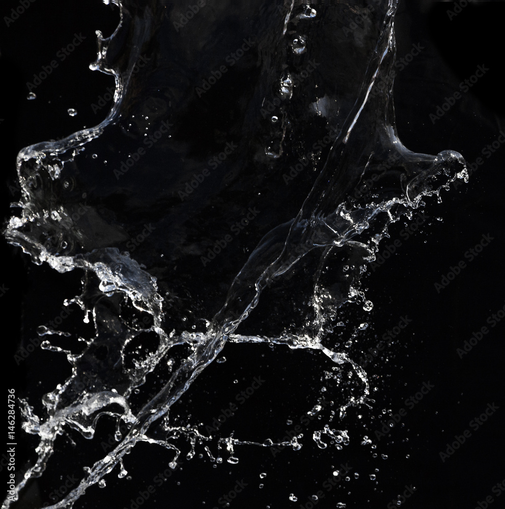 Water splash on black background Stock Photo | Adobe Stock