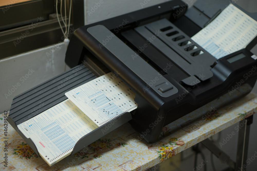 Optical mark recognition or OMR sheet on scanning machine Stock Photo ...