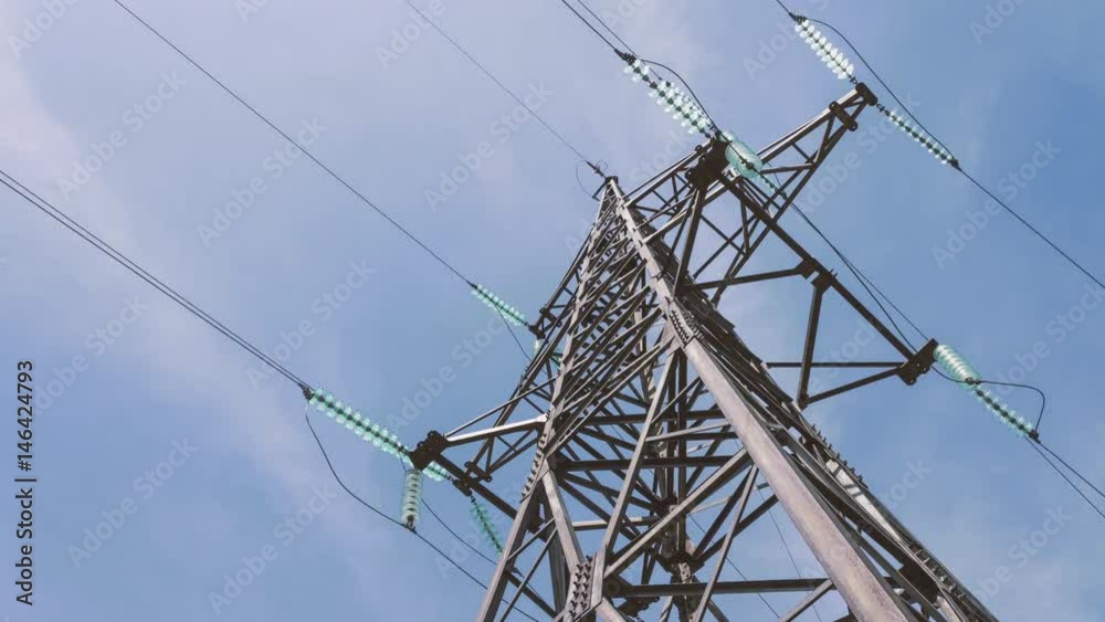 Electric high voltage support. Wire with insulators against the sky ...