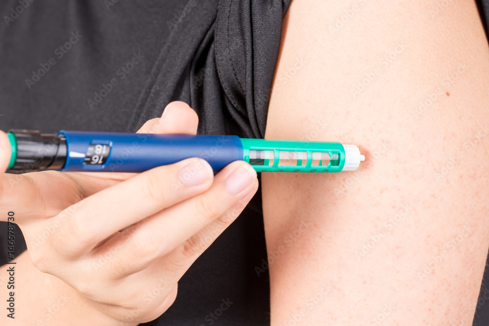 patient use insulin pen self insulin injection Stock Photo | Adobe Stock