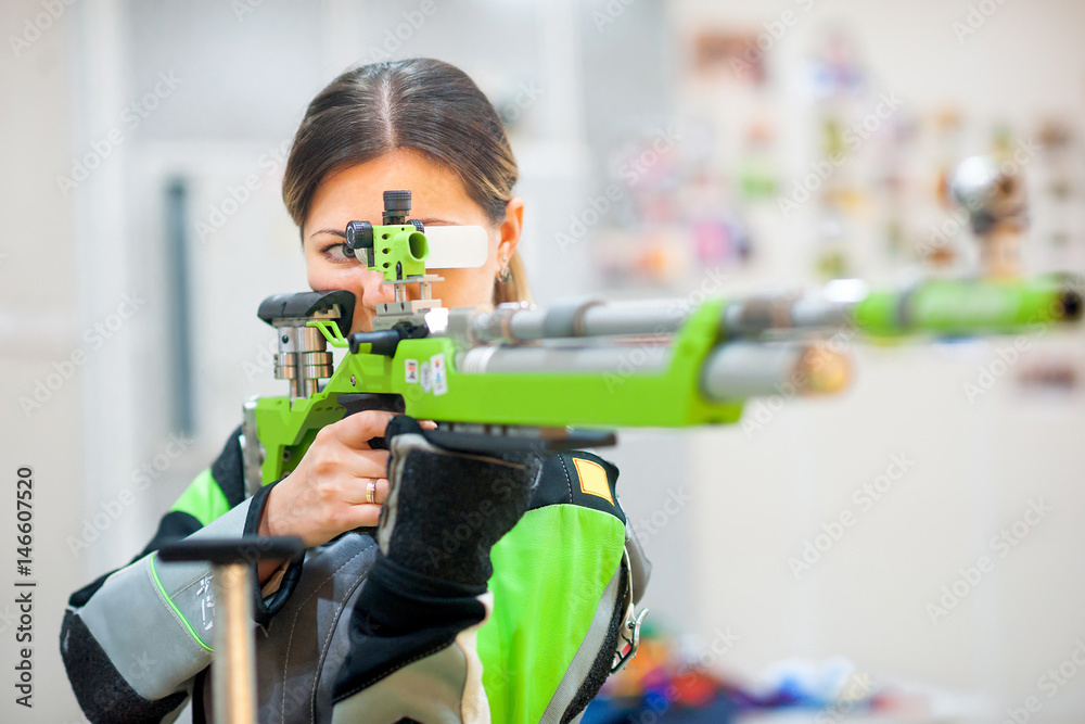 girl the athlete with a rifle, at sports firing competitions Stock ...