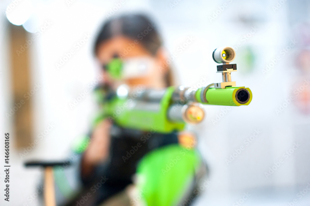girl the athlete with a rifle, at sports firing competitions Stock ...