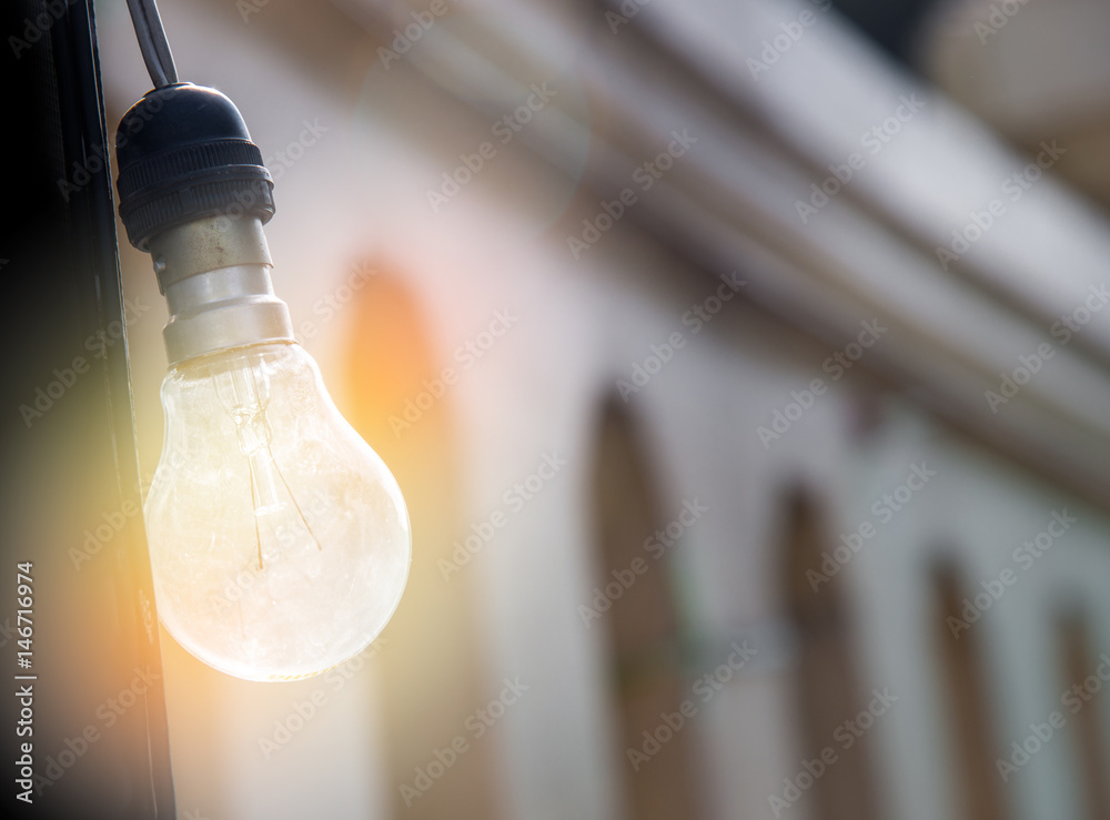 Light bulbs with light effect (yellow and orange Lens Flare light) in ...