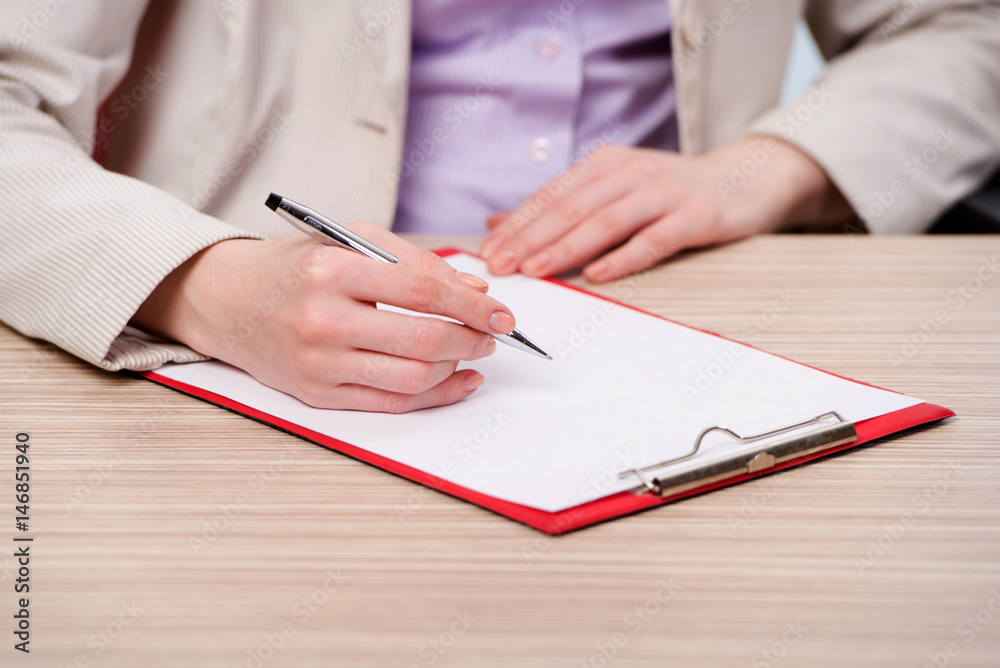 Hands taking notes in the pad Stock Photo | Adobe Stock