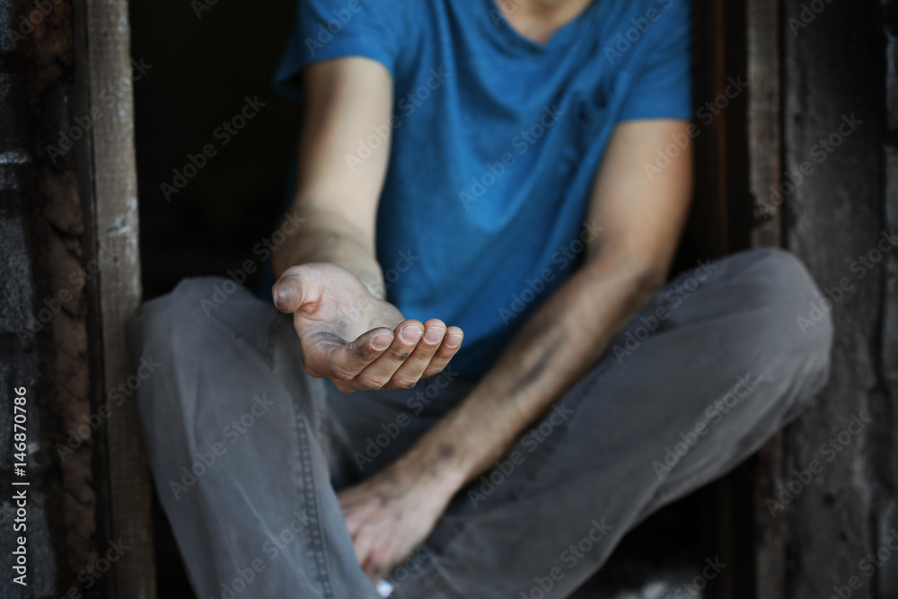 Poor man begging for help on the street Stock Photo | Adobe Stock