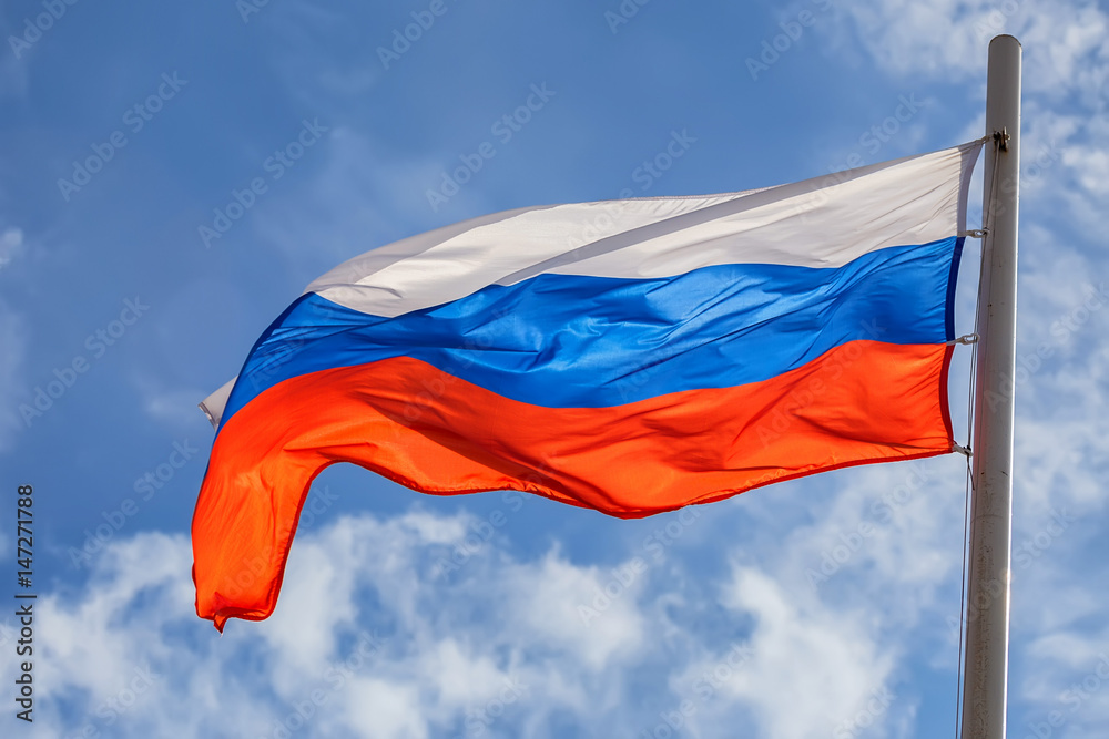 Russian flag on sky and cloud background Stock Photo | Adobe Stock