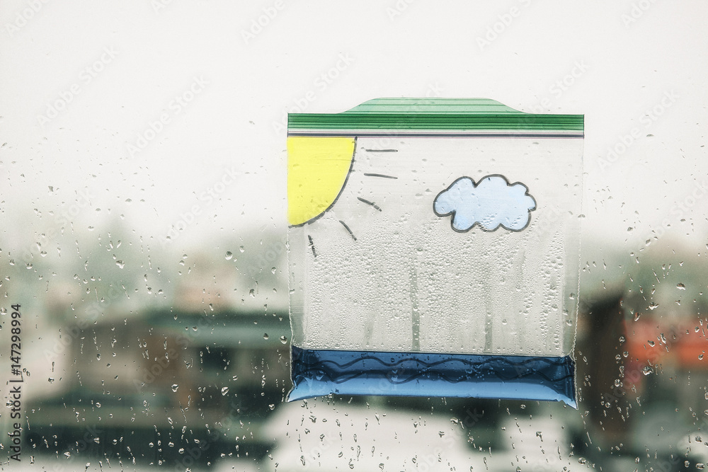water cycle in a bag. a ziplock plastic bag with water and painted on ...