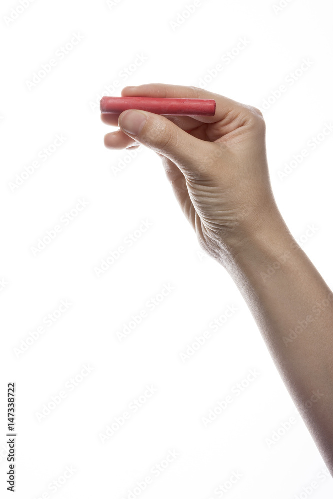 woman hand hold a crayon isolated white. Stock Photo | Adobe Stock