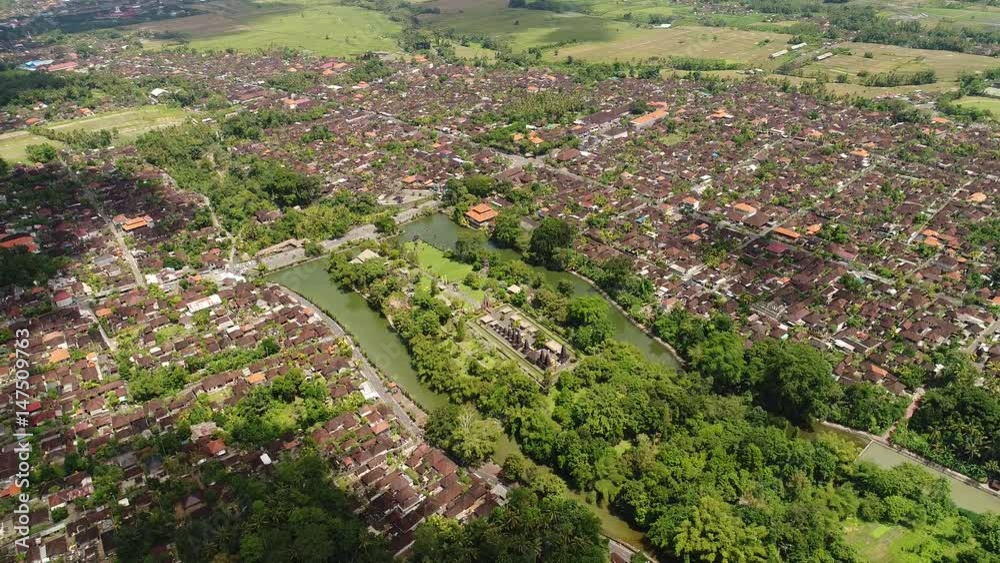 Aerial view in Bali Indonesia : Long. orderly row of structures with ...
