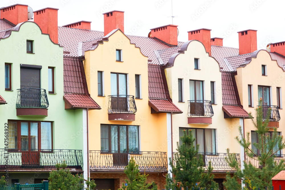 Colorful houses facades, pastel pale colors in Europe. Stock Photo ...