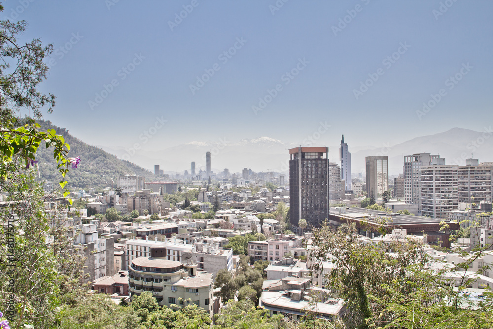 View over the city skyline. Mountain range in the background. Stock ...