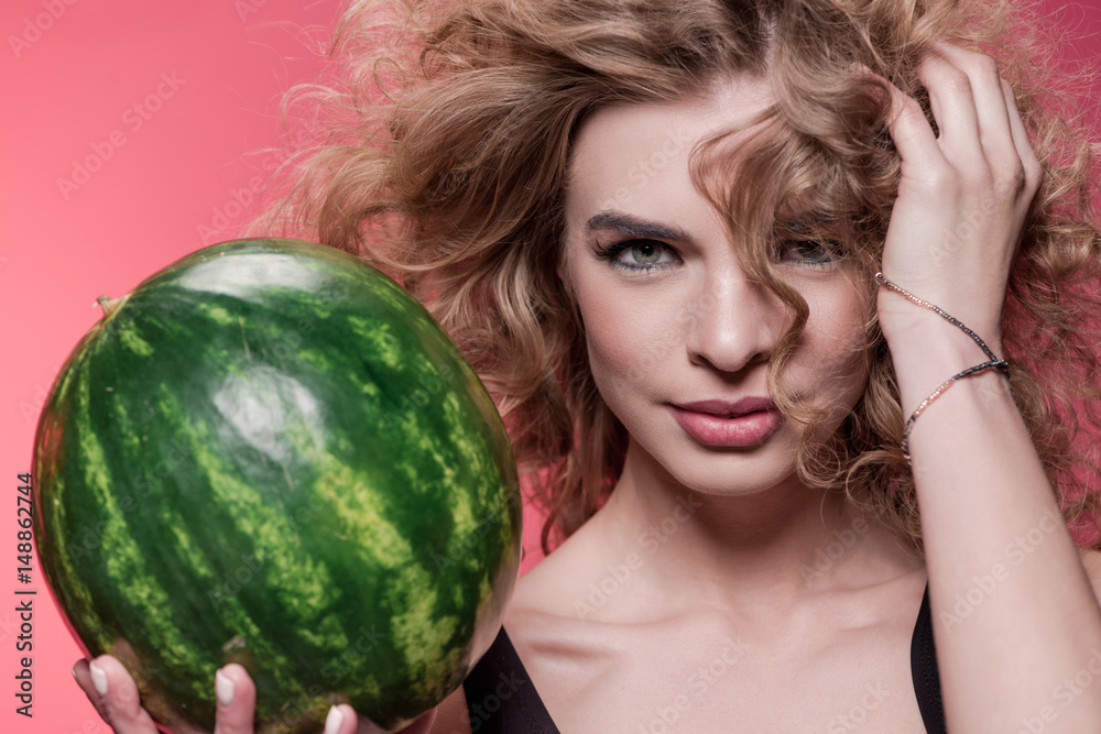 portrait of woman holding fresh watermelon isolated on pink Photos ...