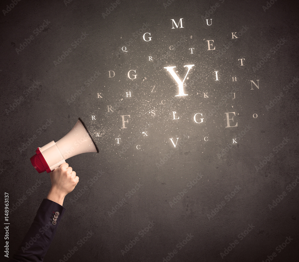 Megaphone with letters Stock Photo | Adobe Stock