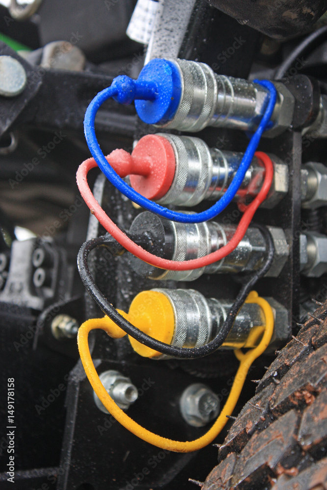 Hydraulic service connections on a tractor Stock Photo | Adobe Stock