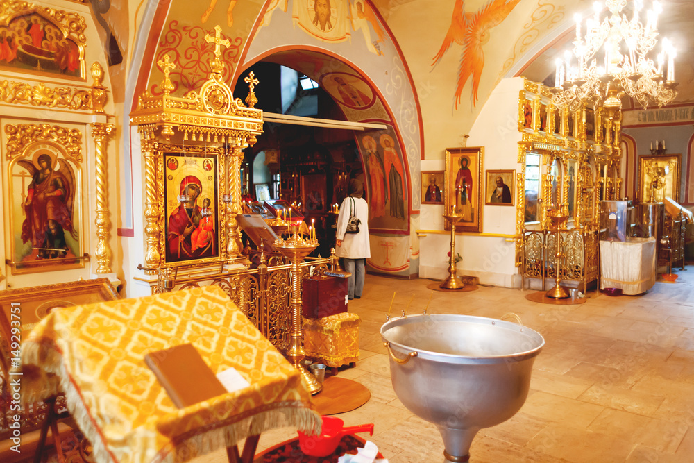 Interior of Orthodox church. Symbolic Orthodox gold cross with the ...