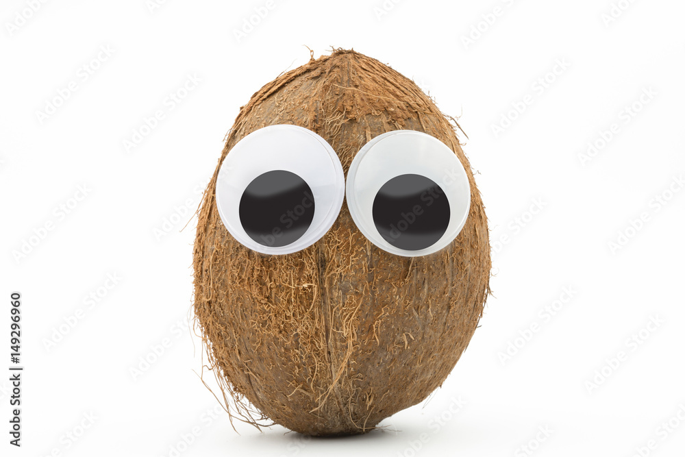 coconut with googly eyes on white background Stock Photo | Adobe Stock