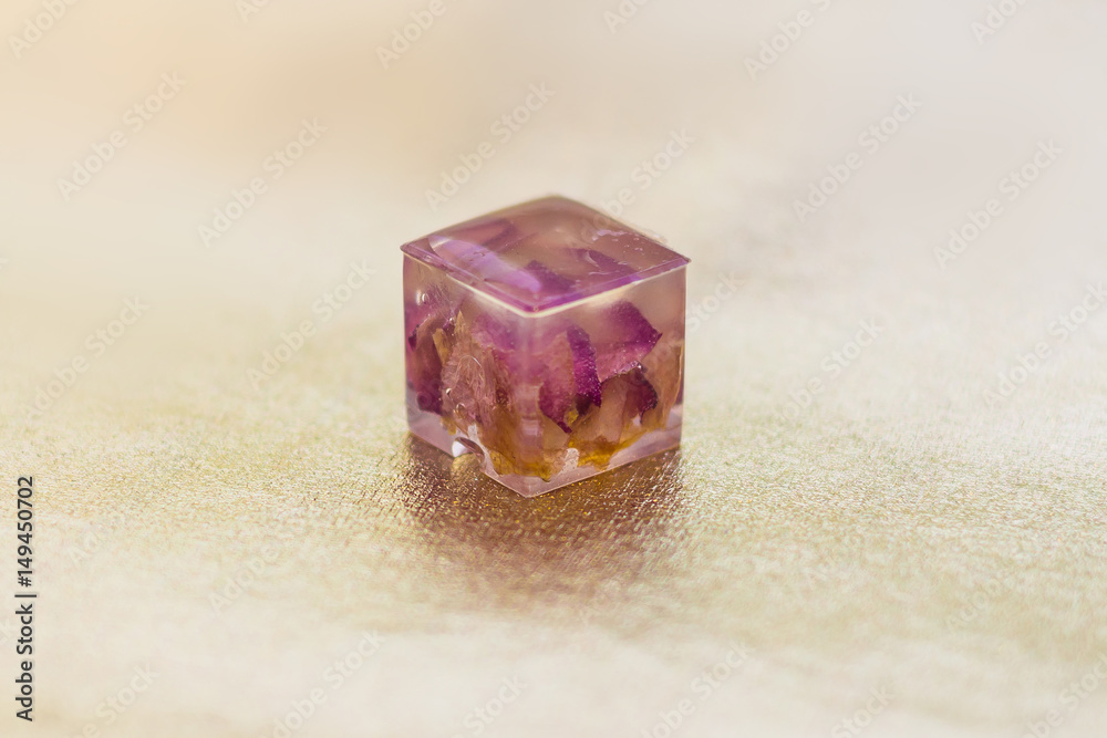 Crystal made of epoxy resin with flowers Stock-Foto | Adobe Stock