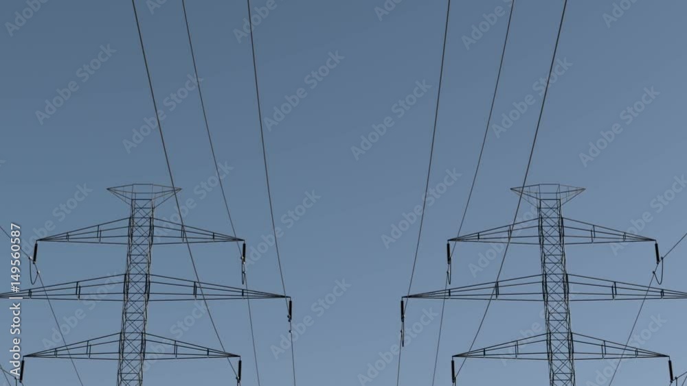 Electricity pylons. Moving along two row of pylons. electric high ...