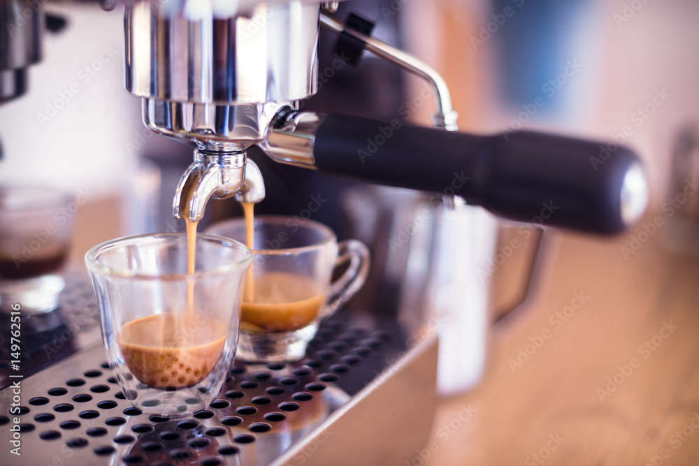 Espresso machine during extraction in a detail shot Stock Photo | Adobe ...