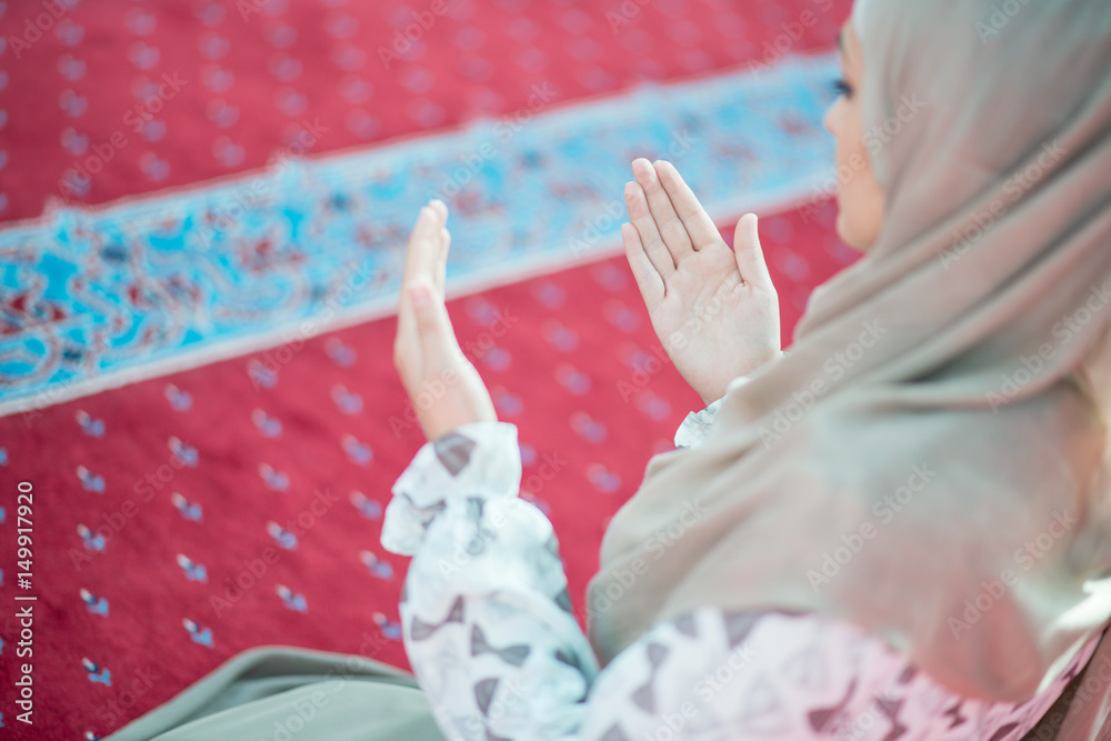 muslim woman praying in mosque Stock Photo | Adobe Stock