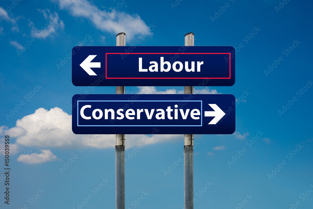 two road signs representing labour and conservative parties in uk early ...