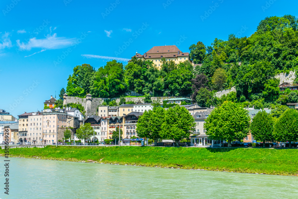 View of riverside of Salzach river in Salzburg, Austria. Stock Photo ...