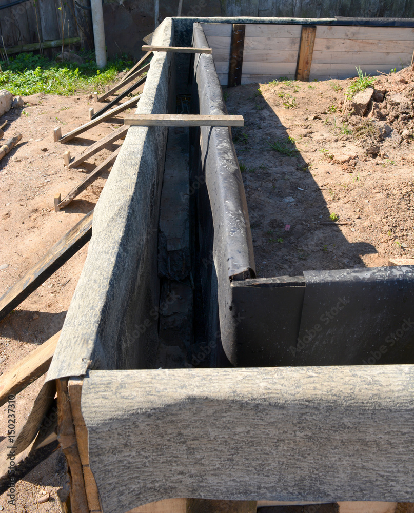 Construction of a strip foundation for a bath, formwork, struts Stock ...