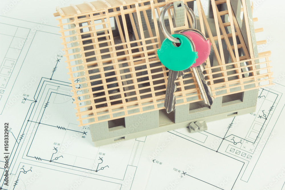 Electrical drawings and diagrams with house under construction and home ...