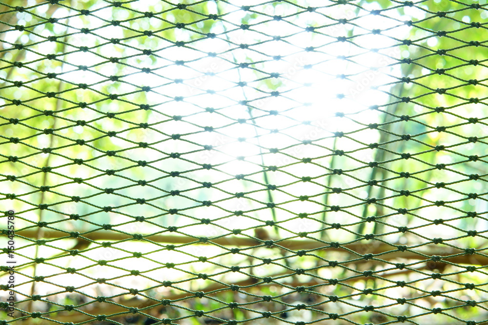 Fishing net background with sunlight Stock Photo | Adobe Stock
