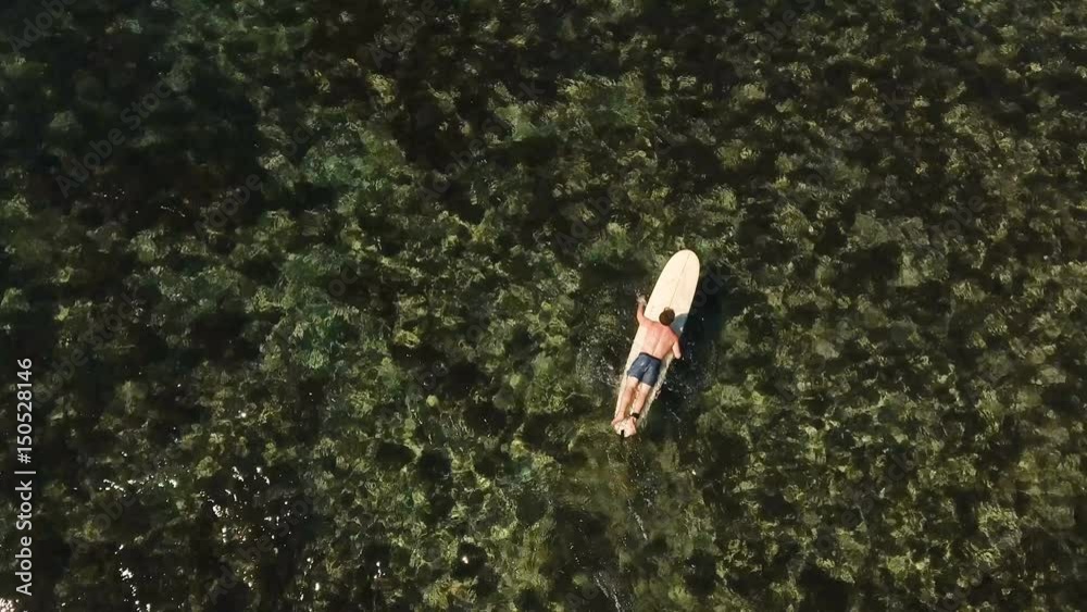 Surfers at siargao islands famous surf break cloud 9 near mindanao the ...