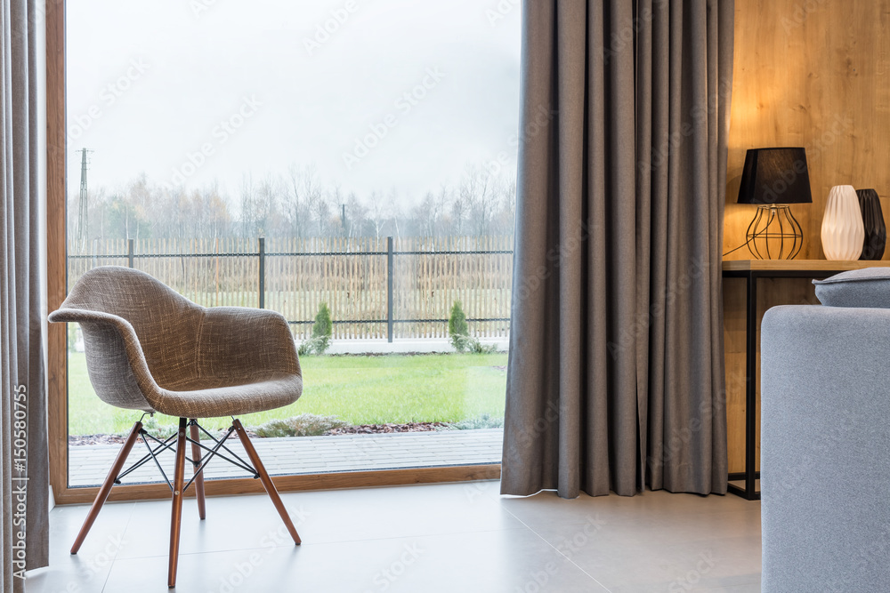 Chair in room with window Stock Photo | Adobe Stock