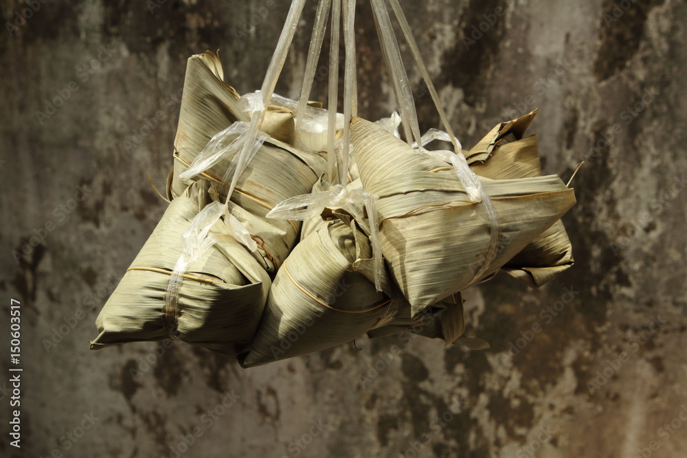 Zongzi, pyramid-shaped sticky, glutinous rice dumplings wrapped by ...