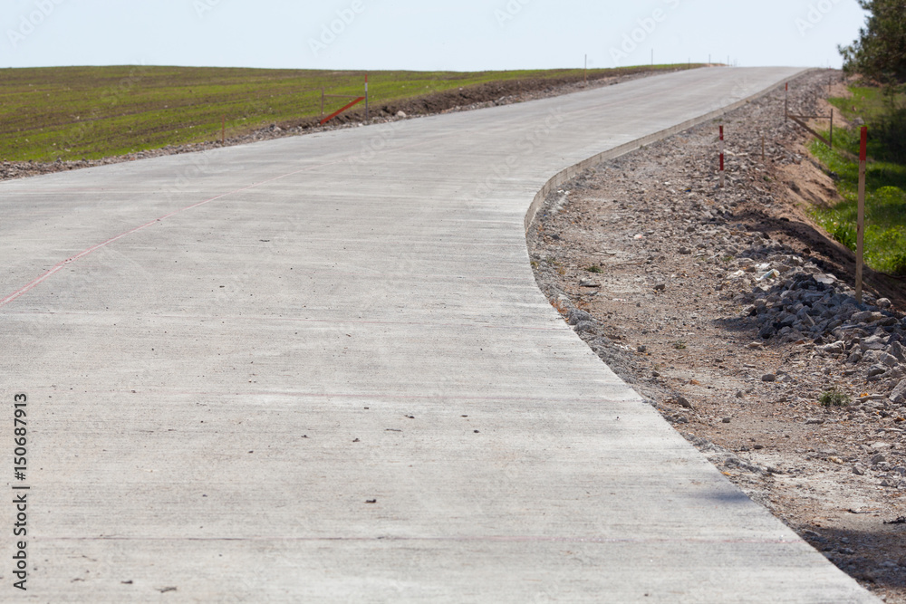 Just built road. The newly constructed road that goes far beyond the ...