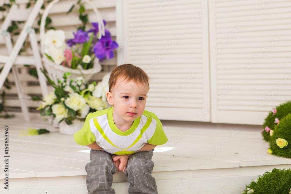 Little boy showing stomach pain Stock Photo | Adobe Stock