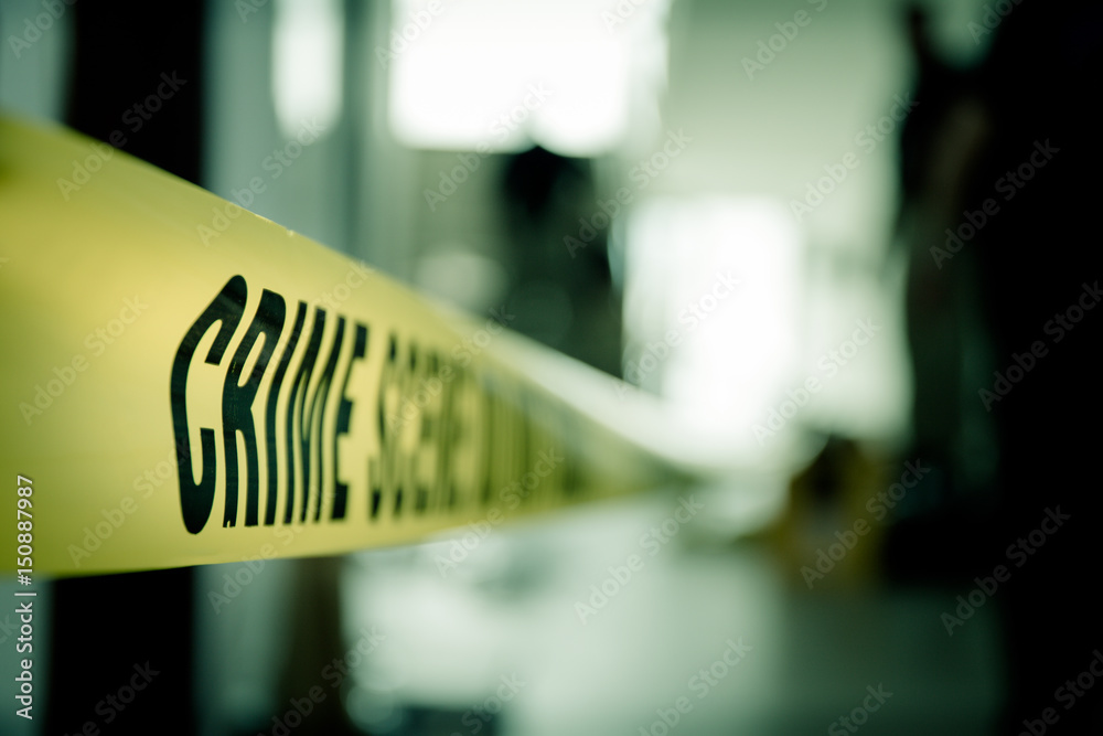 crime scene tape of mysterious case in cenematic tone with copy space ...