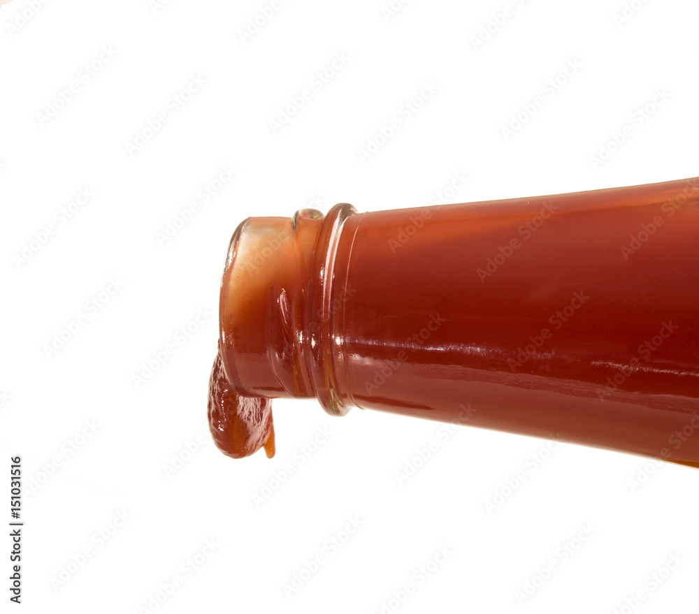 ketchup bottle with a drop coming out of the bottle, isolated on white ...