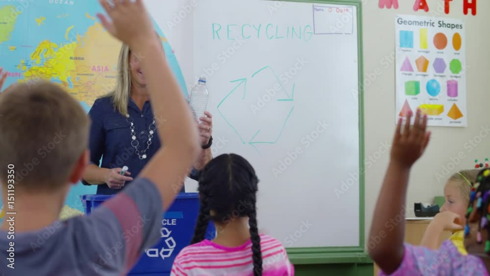 Teacher giving recycle lesson in school classroom Stock Video | Adobe Stock