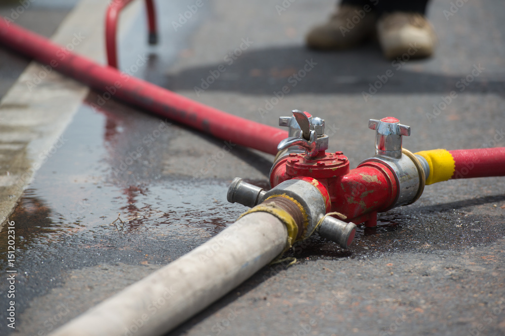 fire hose and connector Stock Photo | Adobe Stock