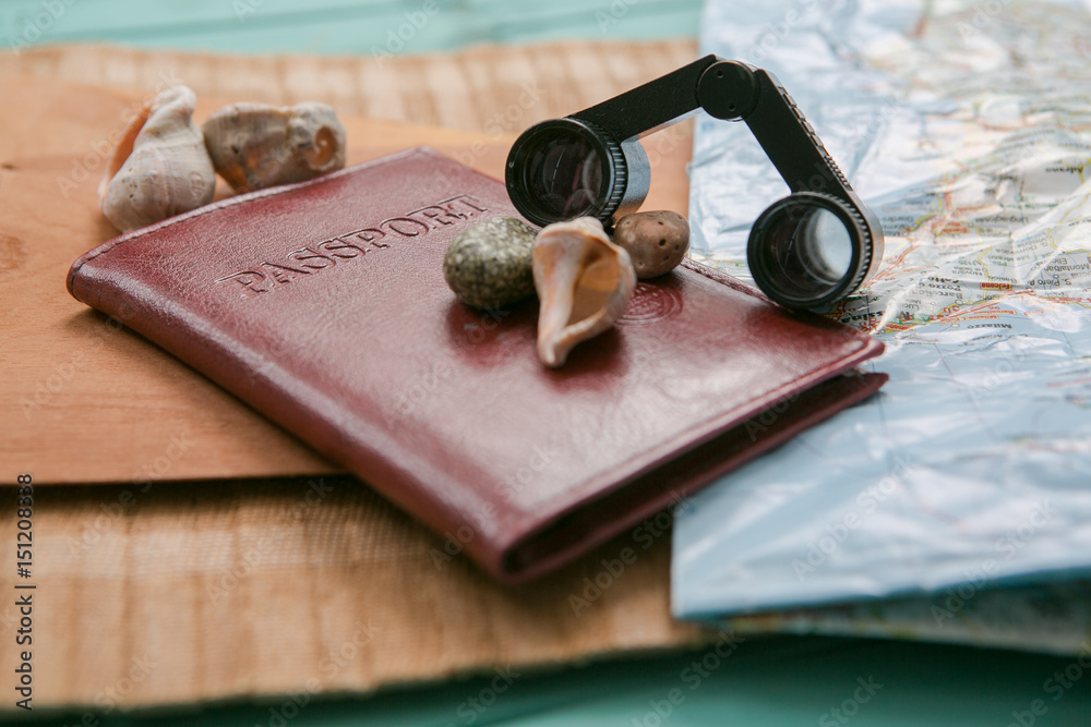 Travel planning - map with passport, shells and binoculars Stock Photo | Adobe Stock