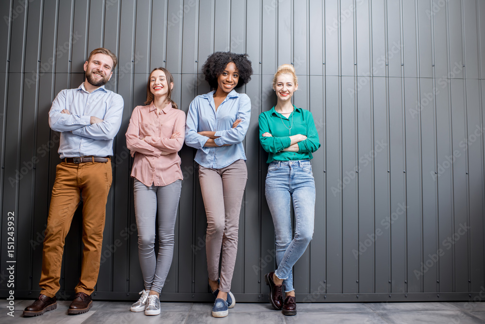 Coworkers on the wall background Stock Photo | Adobe Stock